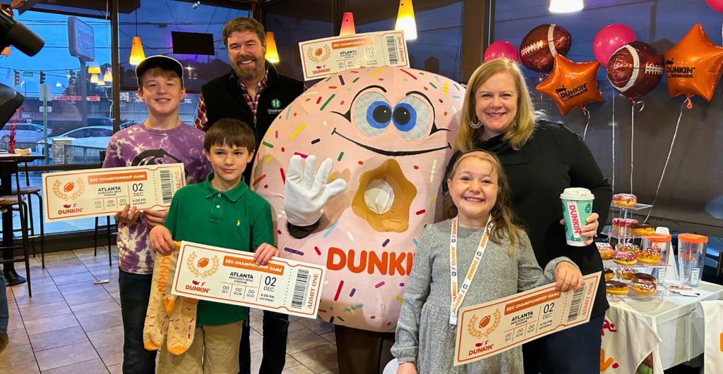 Dunkin’ Surprises Young Cancer Patient with VIP SEC Championship Game ...